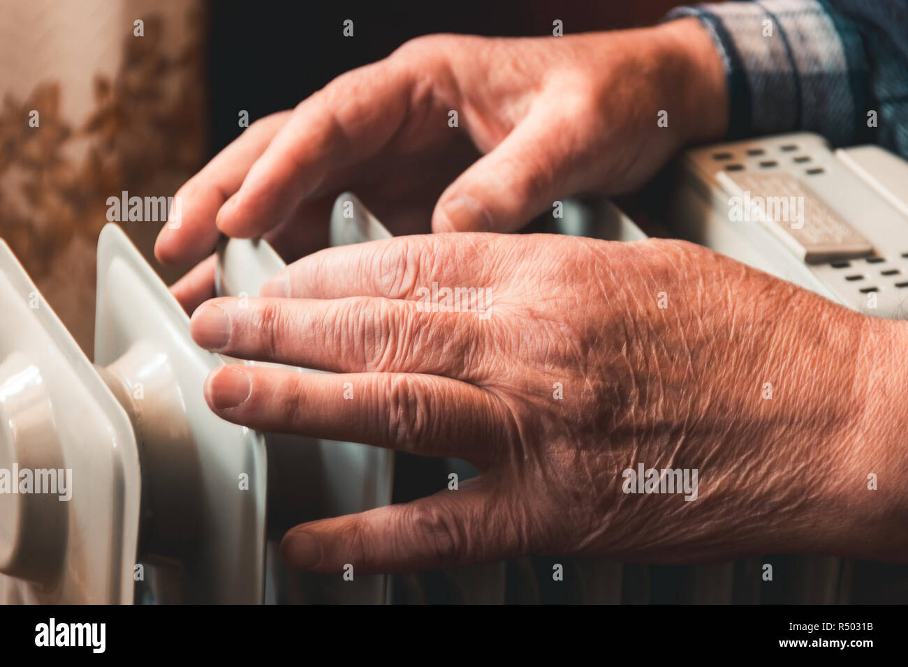 Elderly and bill and heater hi-res stock photography and images - Alamy