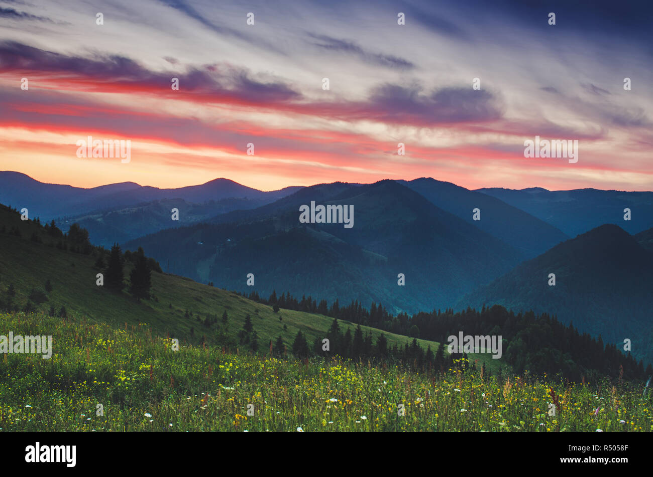 Colorful mountain sunset Stock Photo - Alamy