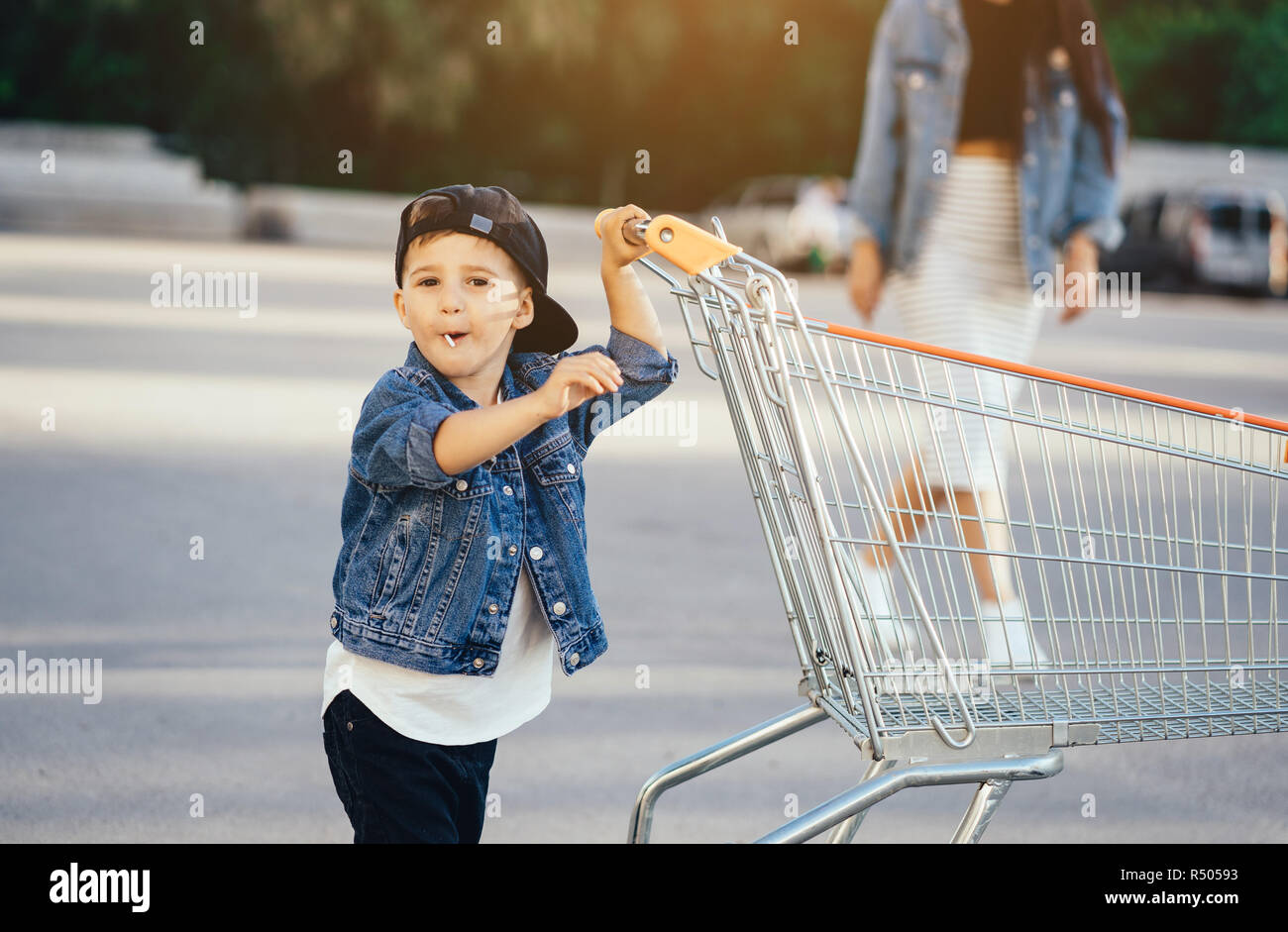 Baby in a cart smiling hi-res stock photography and images - Alamy