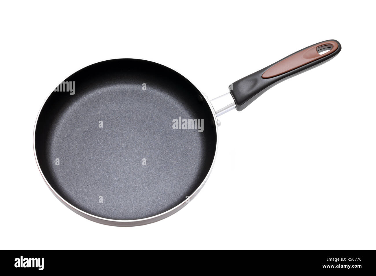 large frying pan isolated on white background Stock Photo - Alamy