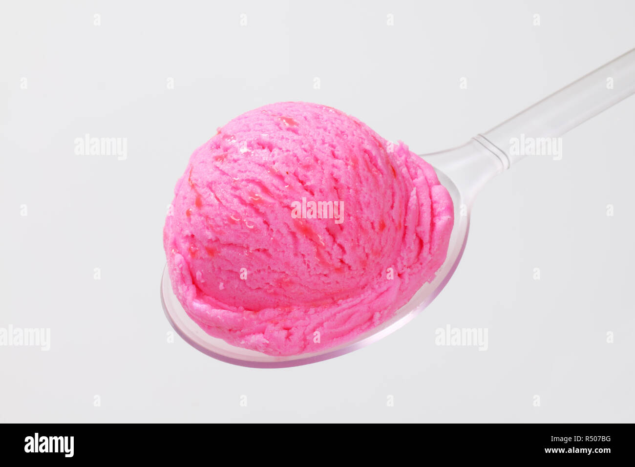 Scoop of pink ice cream on spoon Stock Photo - Alamy