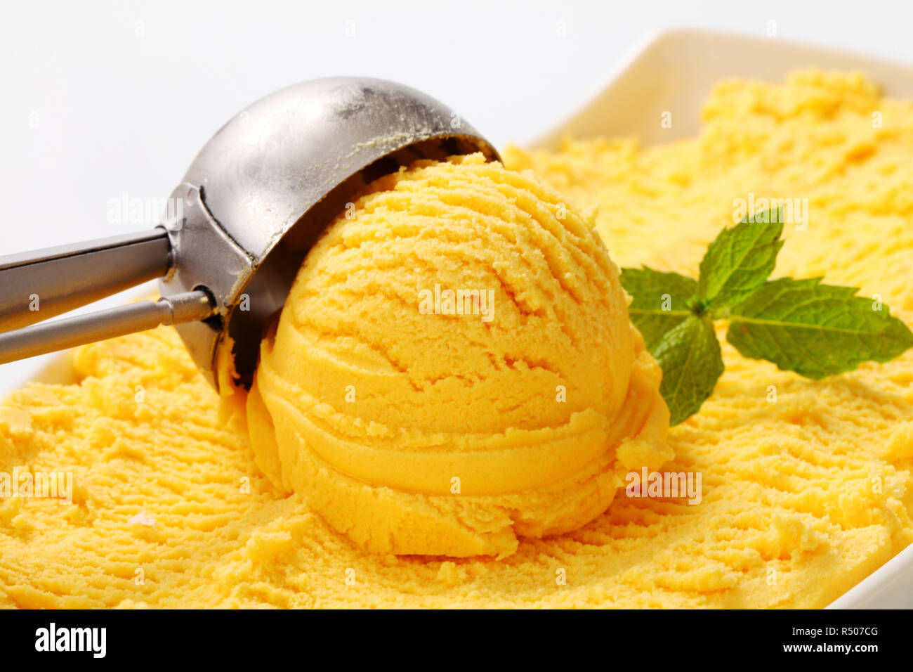 Yellow ice cream Stock Photo - Alamy