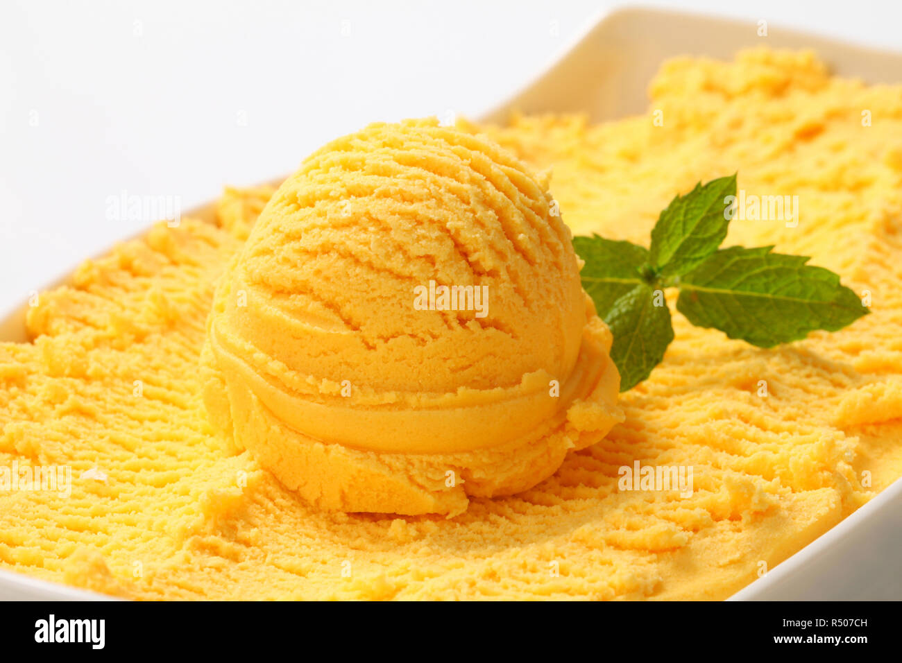Yellow ice cream Stock Photo - Alamy