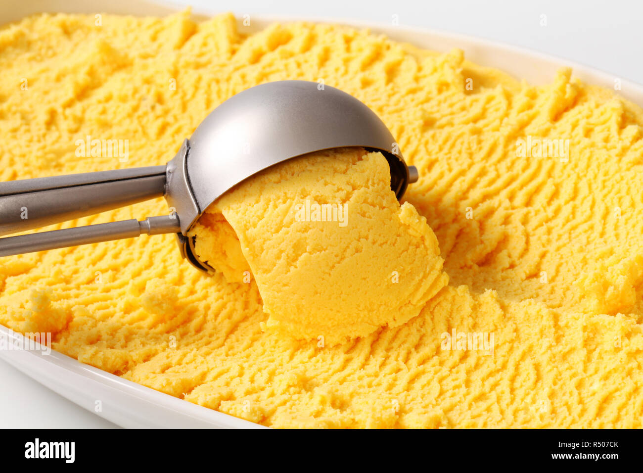 Yellow ice cream Stock Photo - Alamy