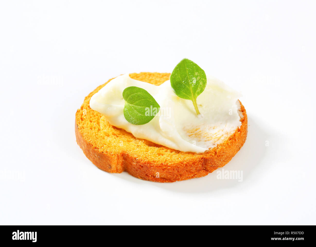 Herb baked cheese Cut Out Stock Images & Pictures - Alamy