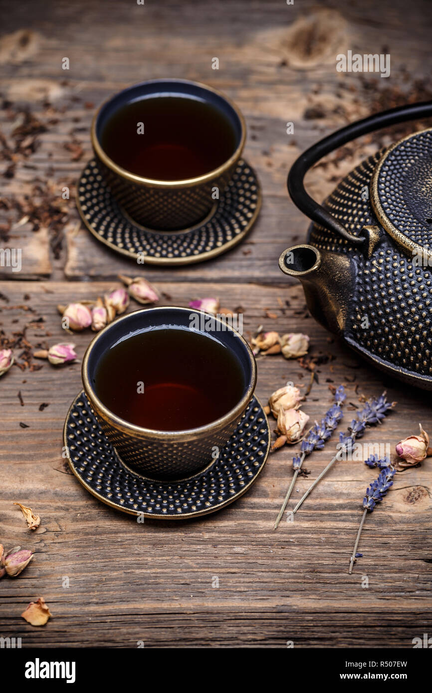 Asian iron tea set Stock Photo - Alamy