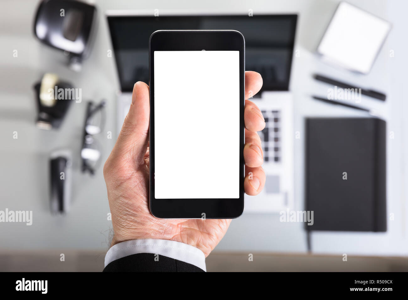 Hand Showing Smart Phone Screen Stock Photo - Alamy