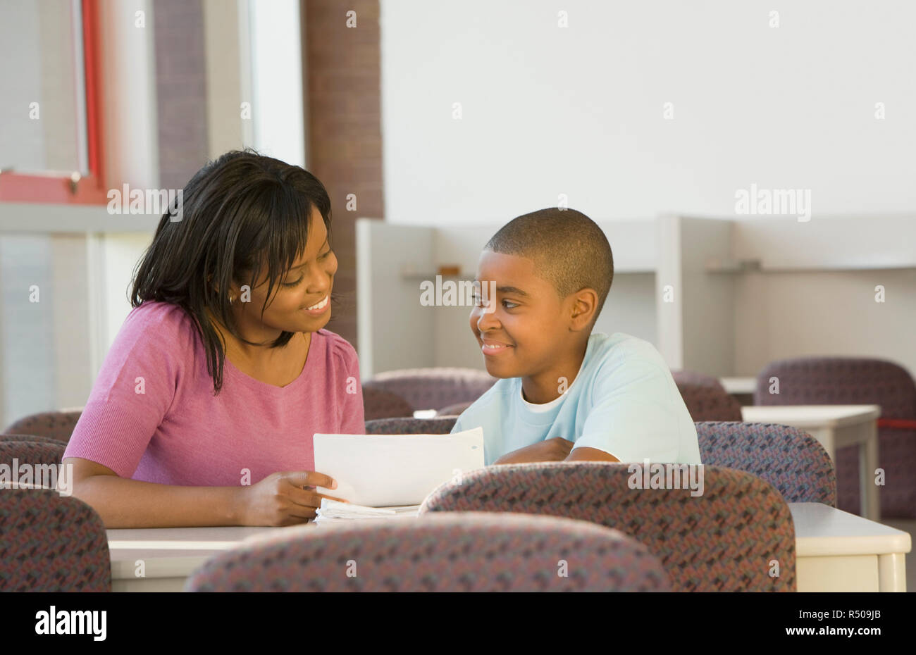 Teacher paperwork with child hi-res stock photography and images - Alamy