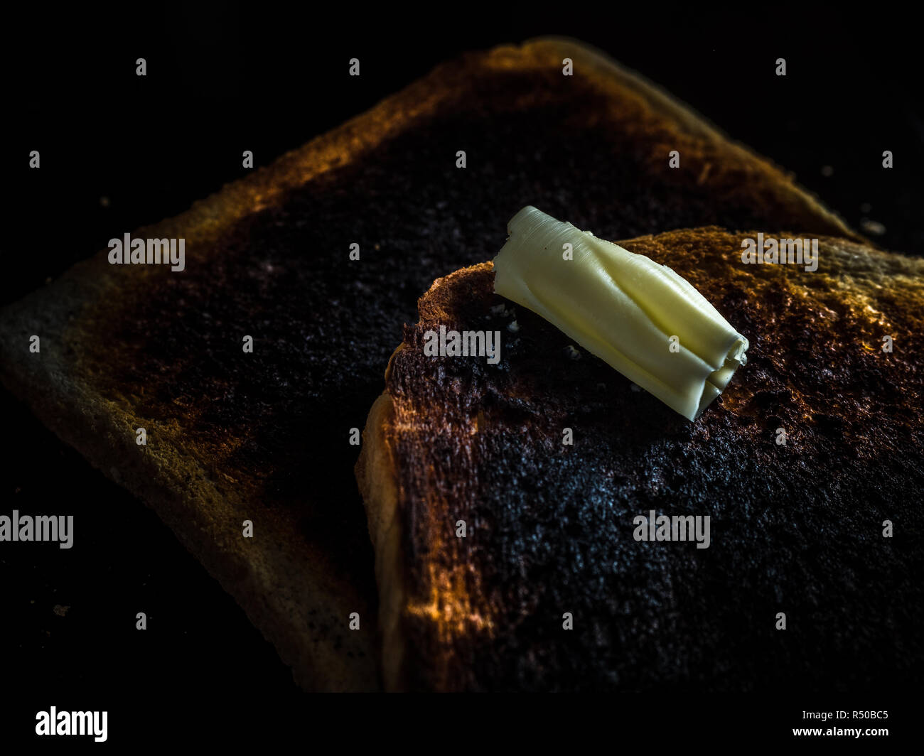 Burnt toast with butter hi-res stock photography and images - Alamy