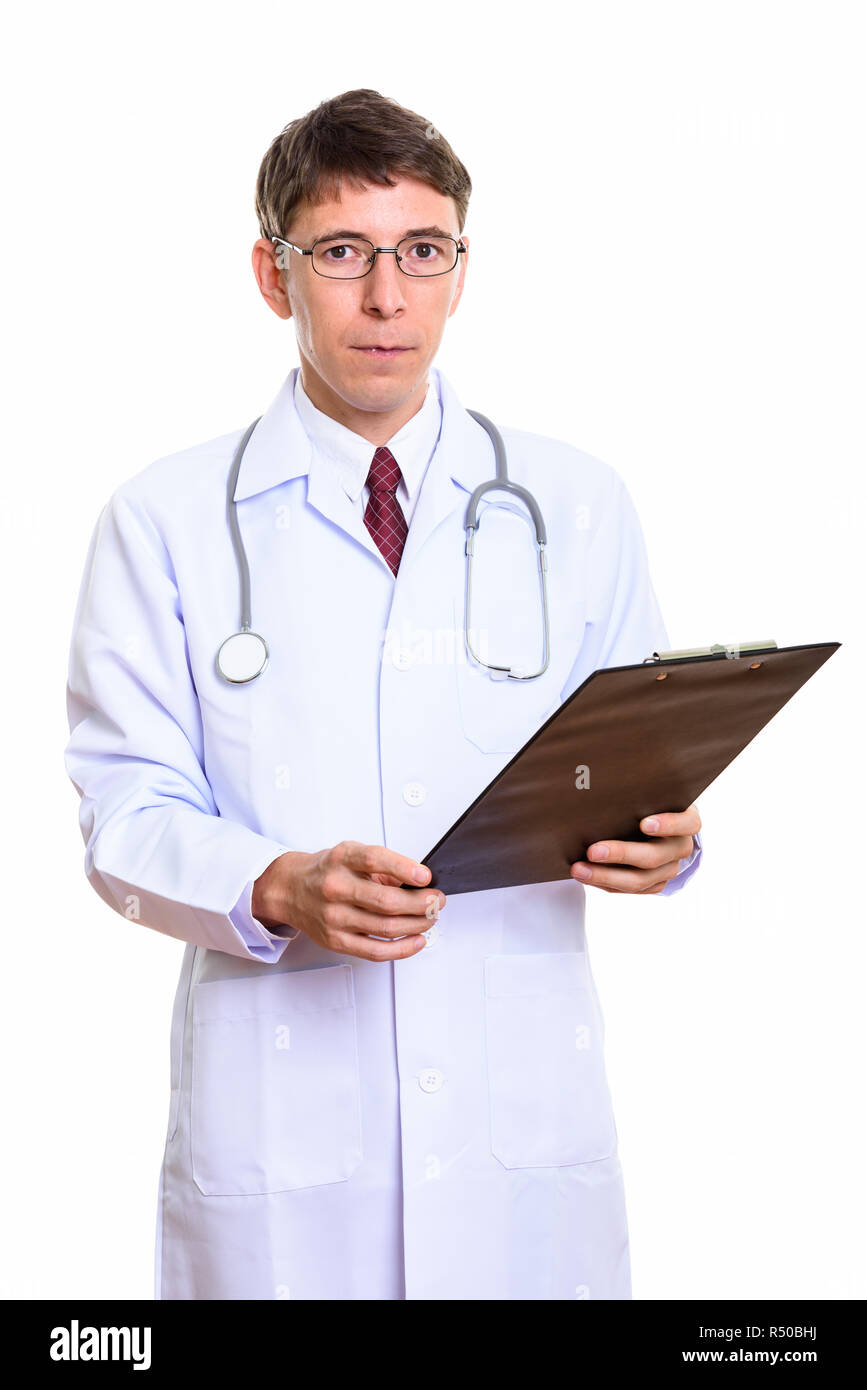 Studio shot of man doctor holding clipboard Stock Photo - Alamy