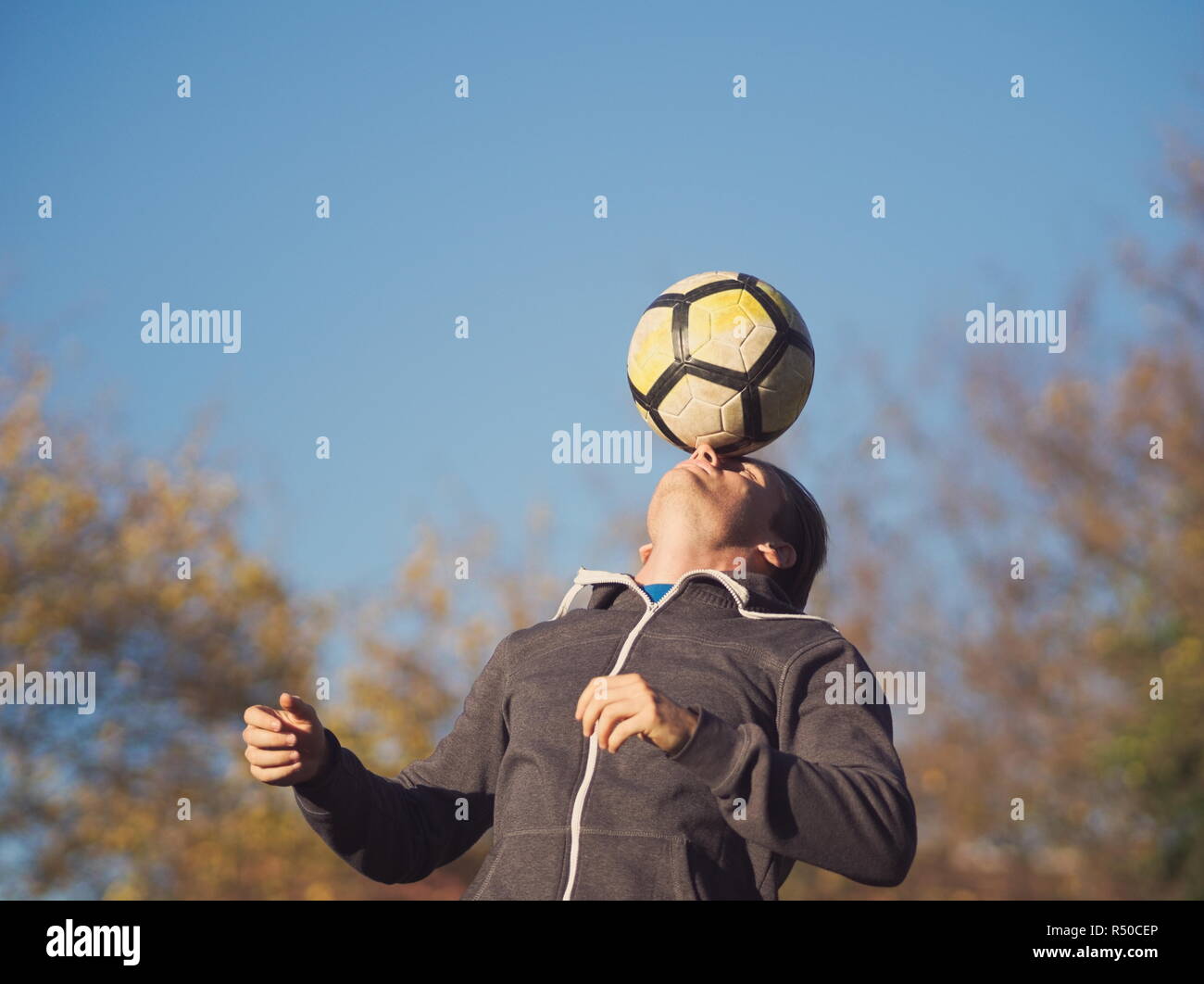 Balancing soccer ball hi-res stock photography and images - Alamy