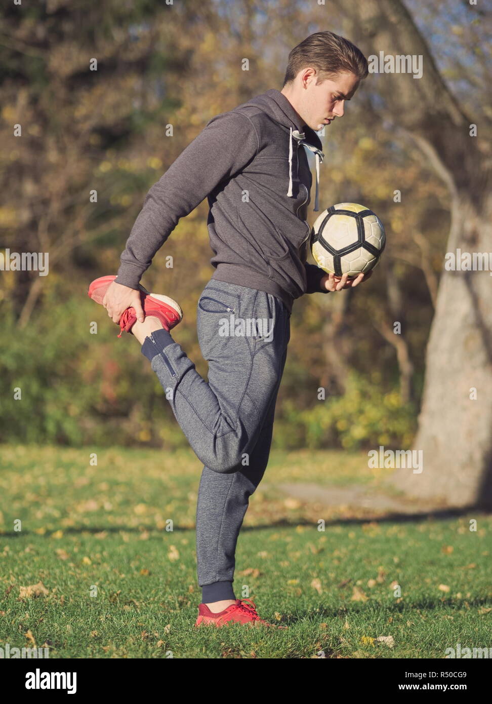 Sport football stretching hi-res stock photography and images - Alamy