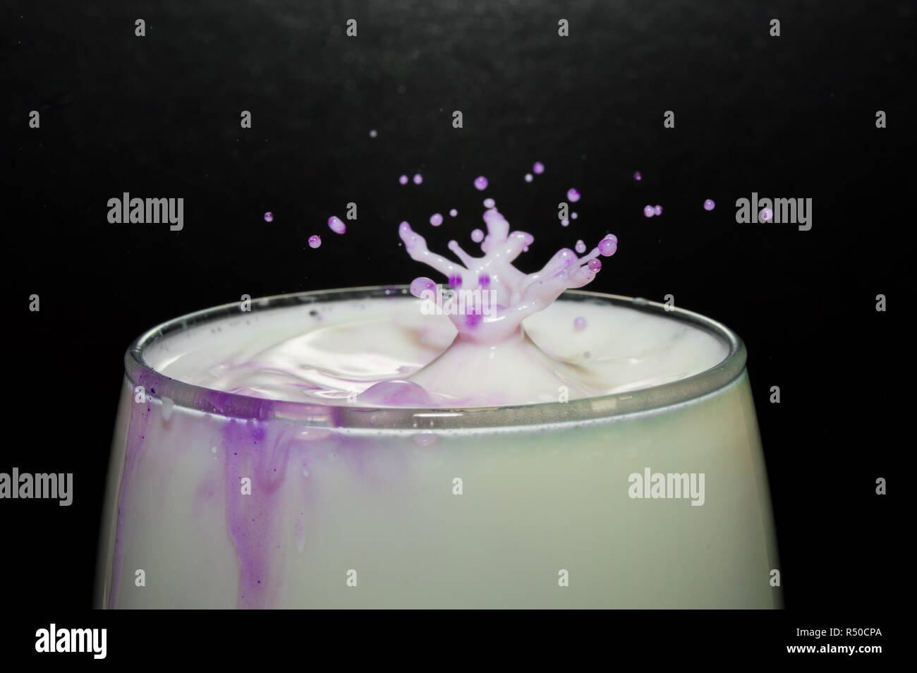 Milk glass falling hi-res stock photography and images - Alamy