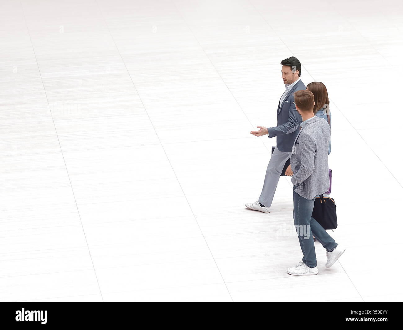 top view, business colleagues walking together Stock Photo - Alamy