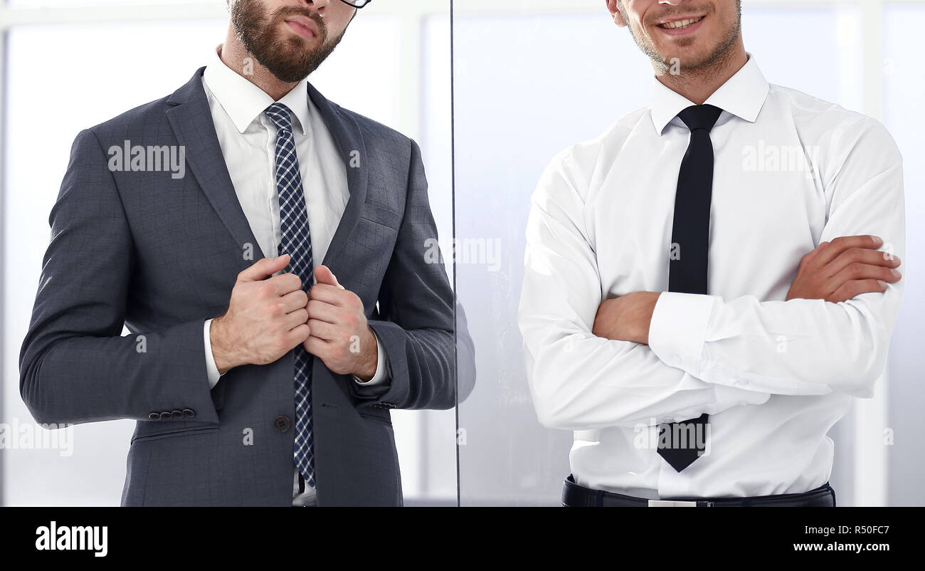 two business people standing in the office Stock Photo - Alamy