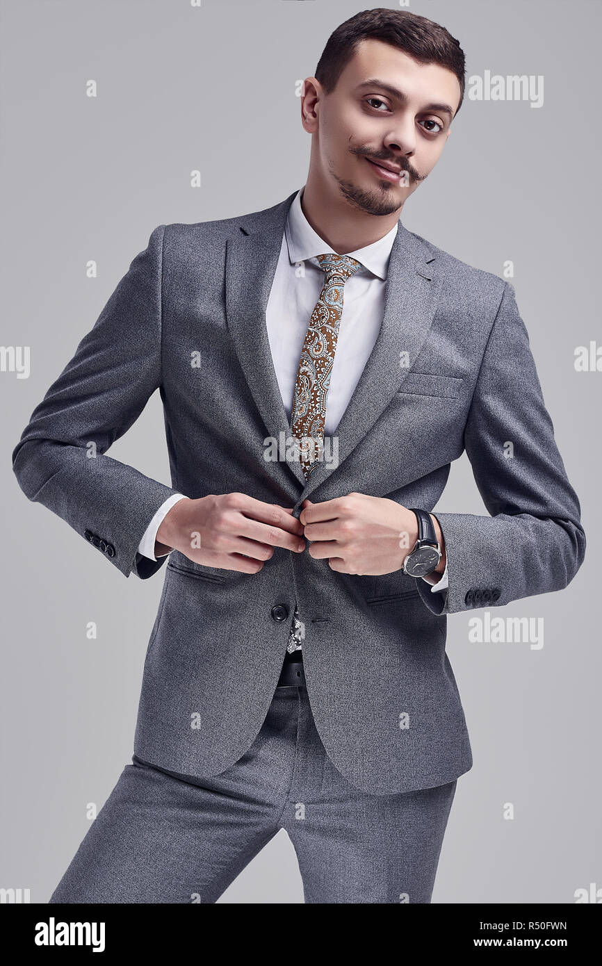 Portrait of handsome young confident arabic businessman with fancy ...