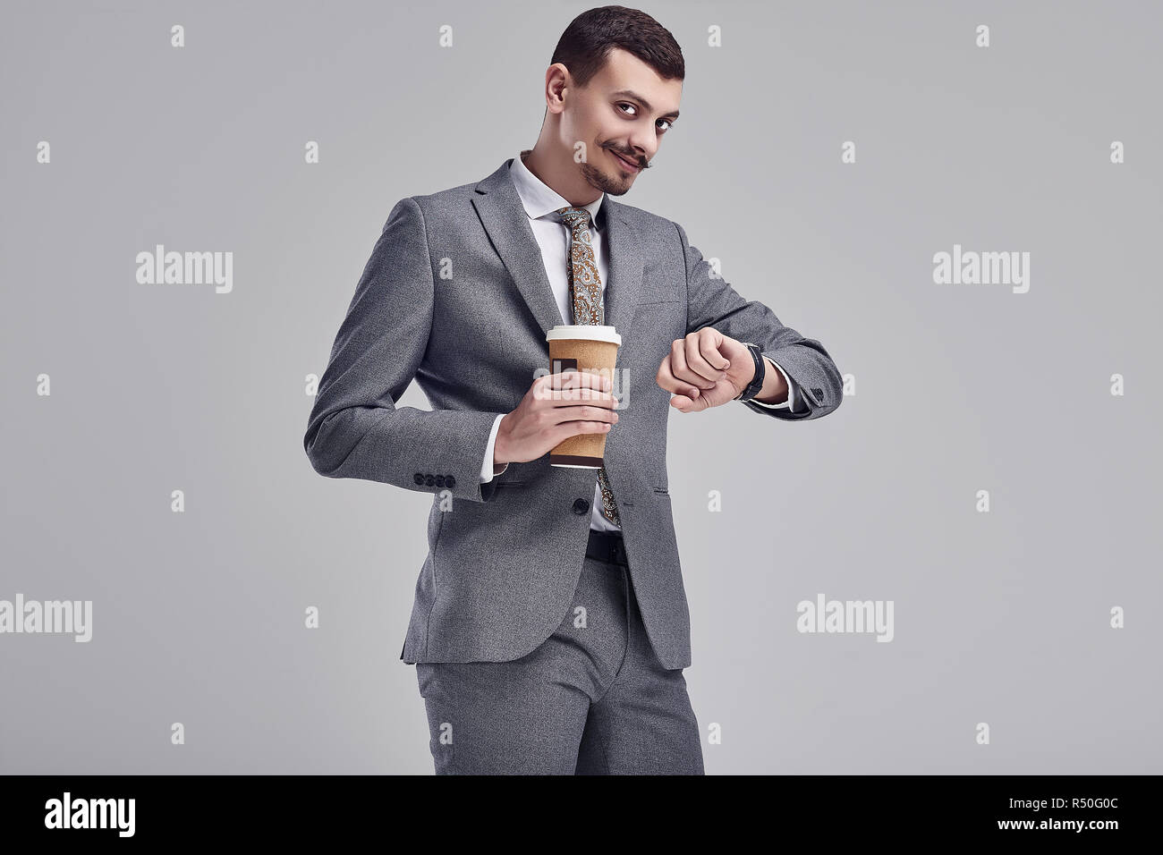 Portrait of handsome young confident arabic businessman with fancy ...