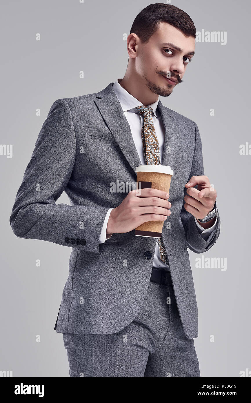 Portrait of handsome young confident arabic businessman with fancy ...