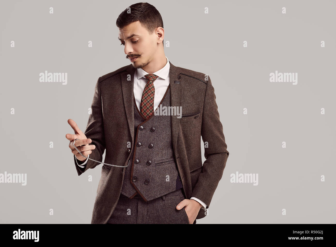 Portrait of handsome young confident arabic businessman with fancy ...