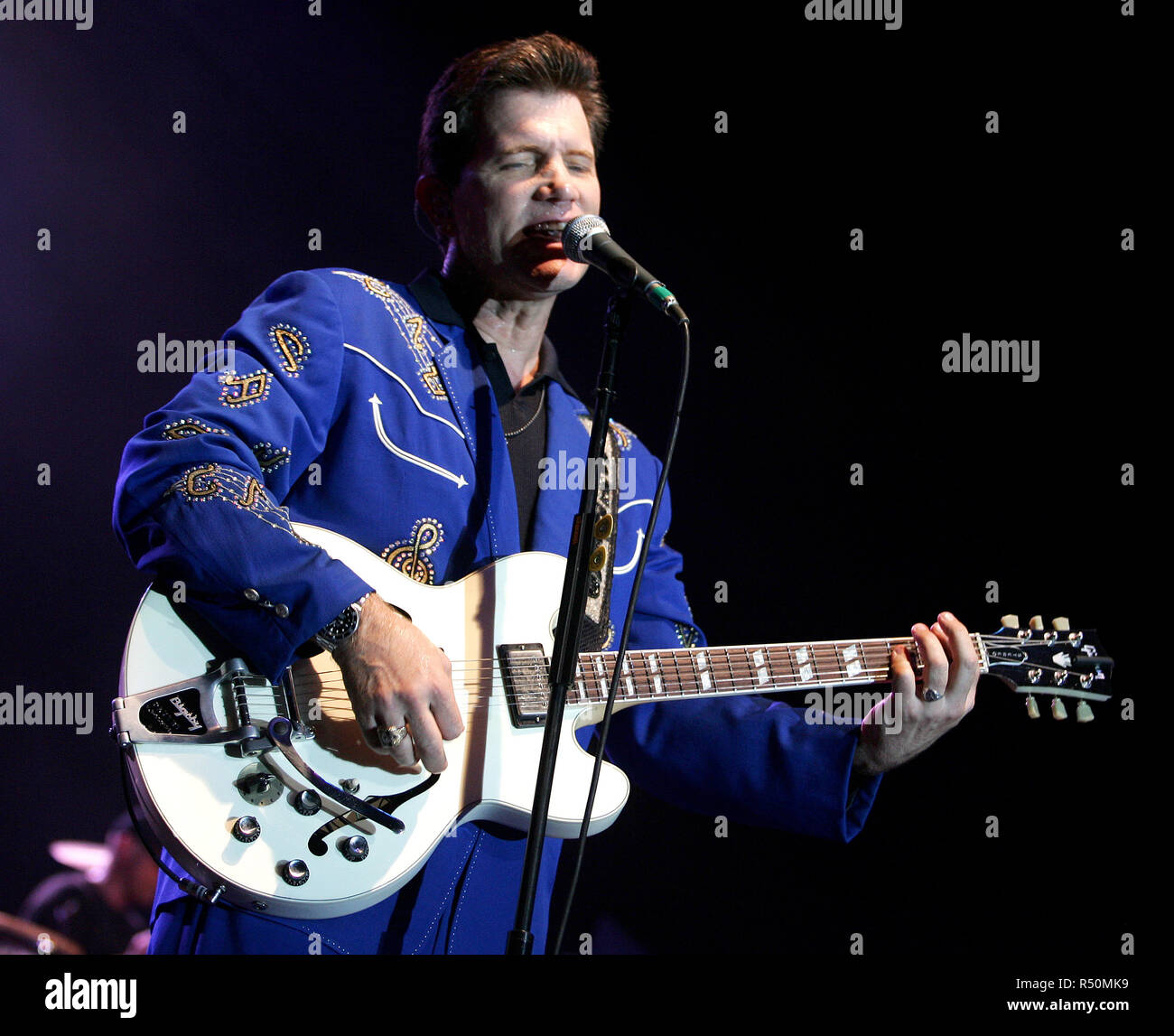 Chris Isaac performs in concert at the Mizner Park Amphitheatre in Boca ...