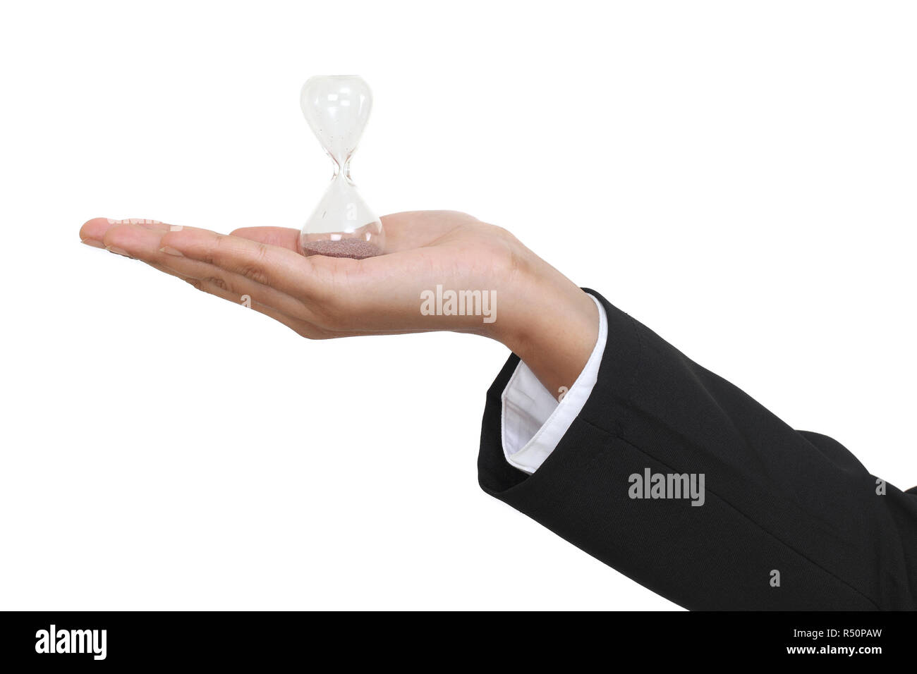 Woman hand holding hourglass hi-res stock photography and images - Alamy