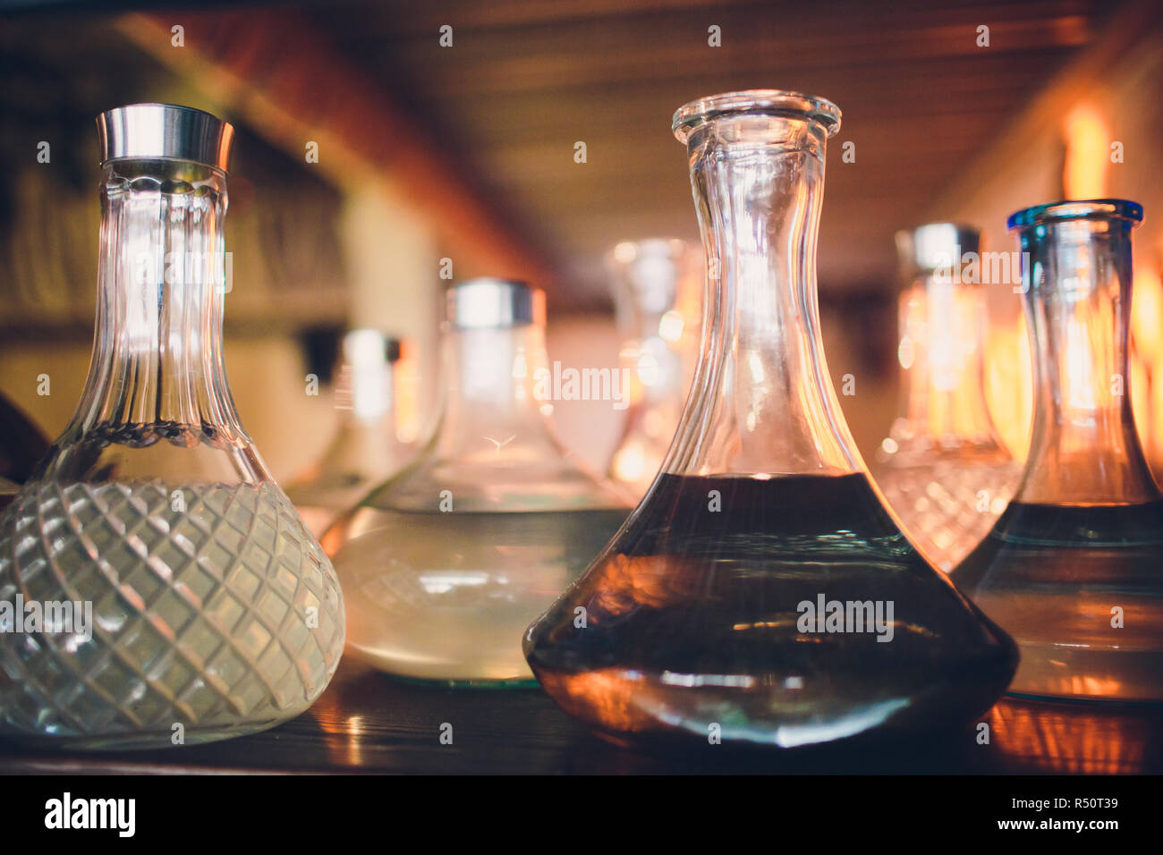 hookah flask. many quantity, stands on wooden Stock Photo - Alamy