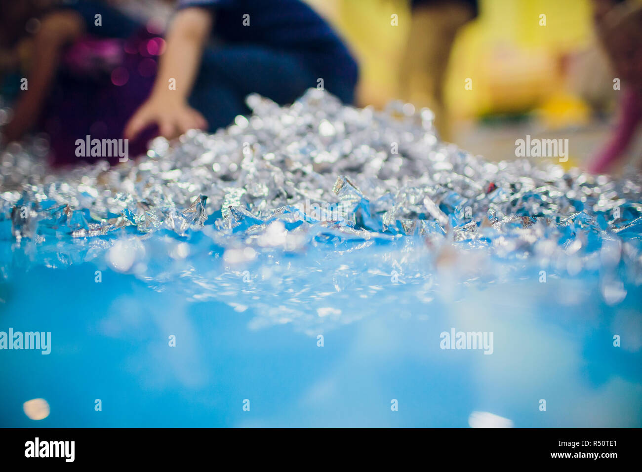 Small pieces crumpled aluminum foils focus on object Stock Photo - Alamy