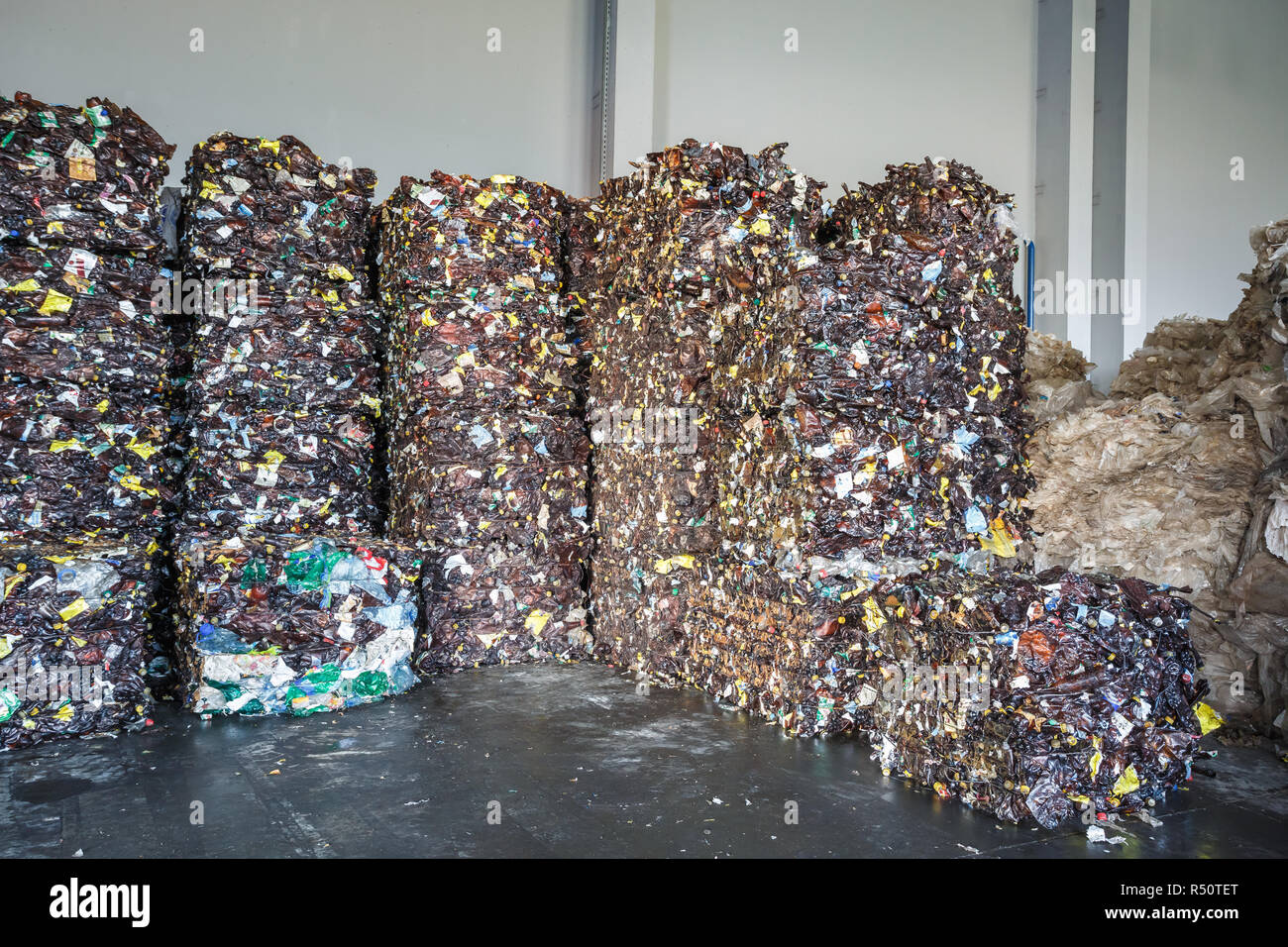 Stock of plastic brown pressed bales at the modern waste hazardous ...