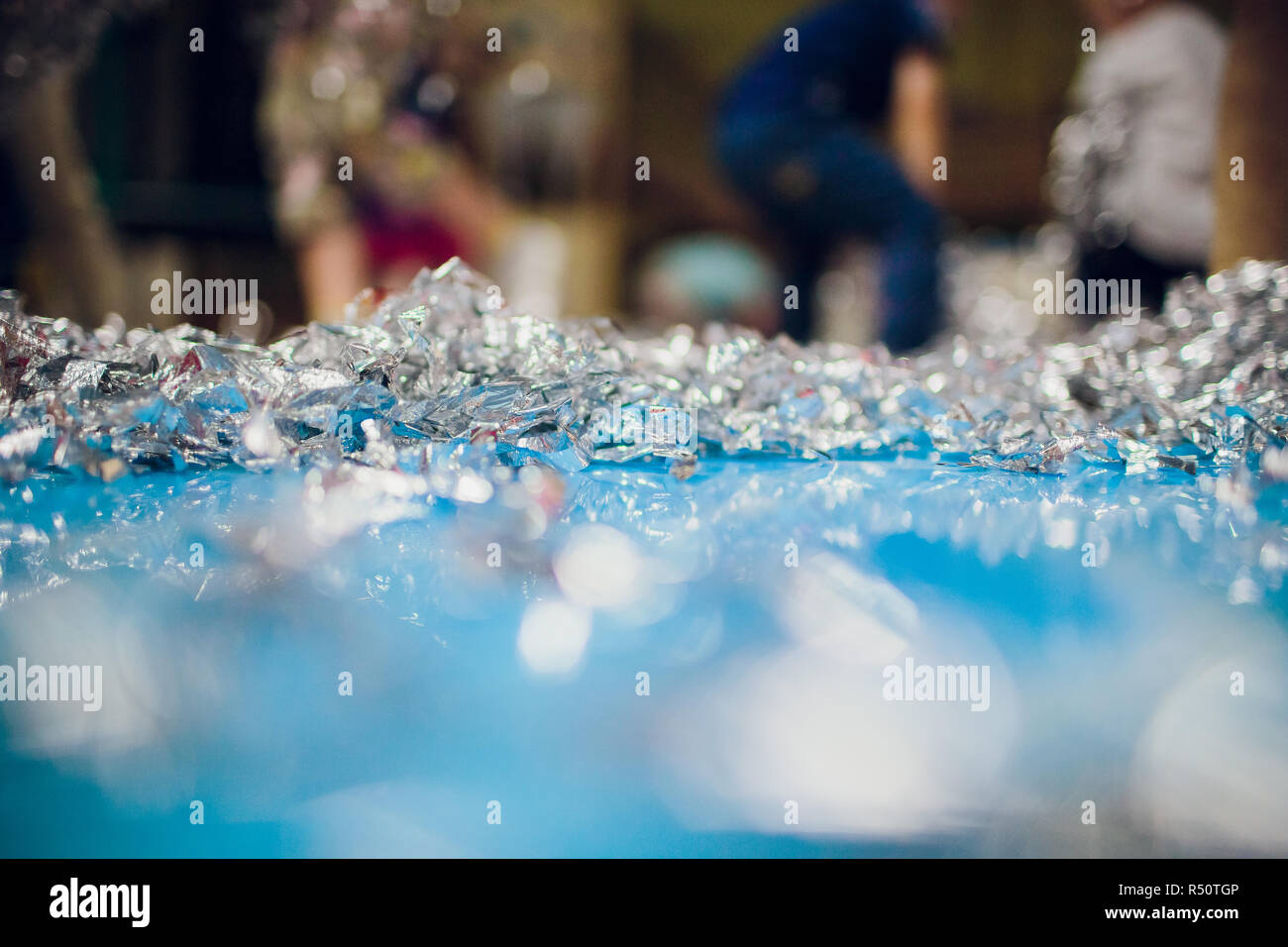Small pieces crumpled aluminum foils focus on object Stock Photo - Alamy