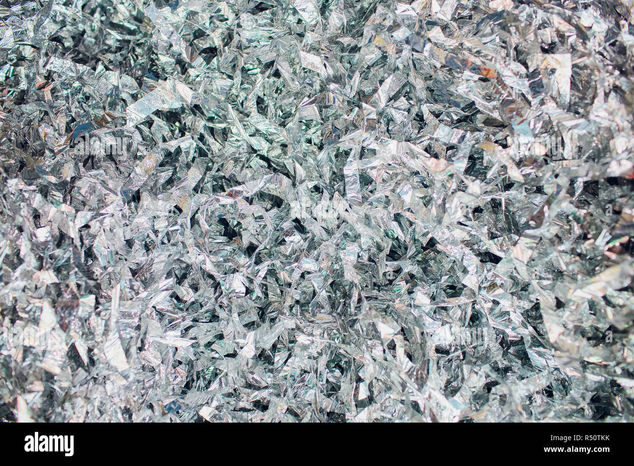 Small pieces crumpled aluminum foils focus on object Stock Photo - Alamy