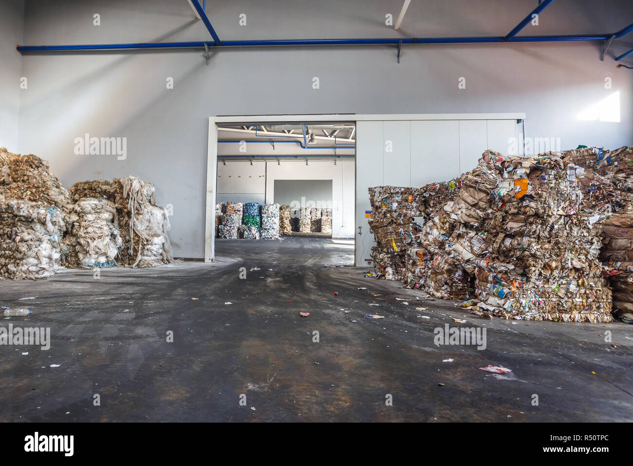 Plastic bales of rubbish at the waste treatment processing plant ...