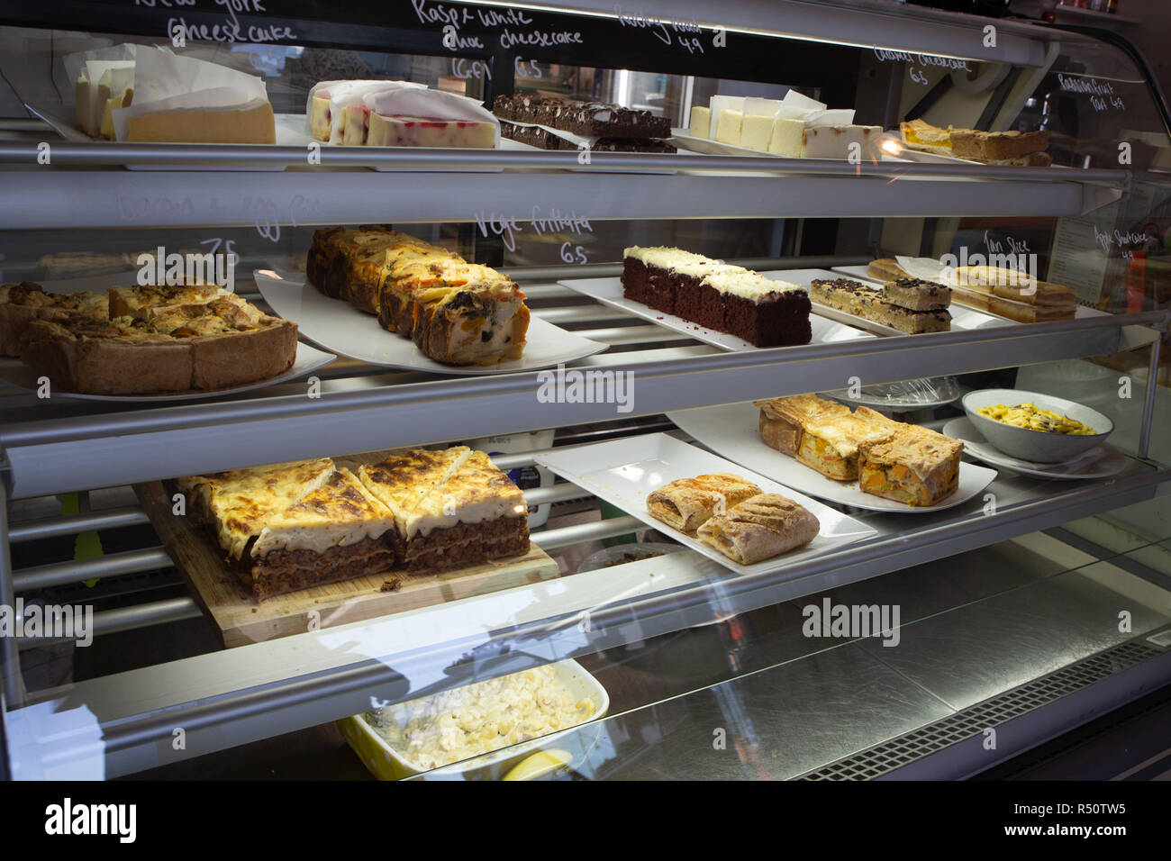 Food ready for the customer to choose in a food cabinet Stock Photo - Alamy