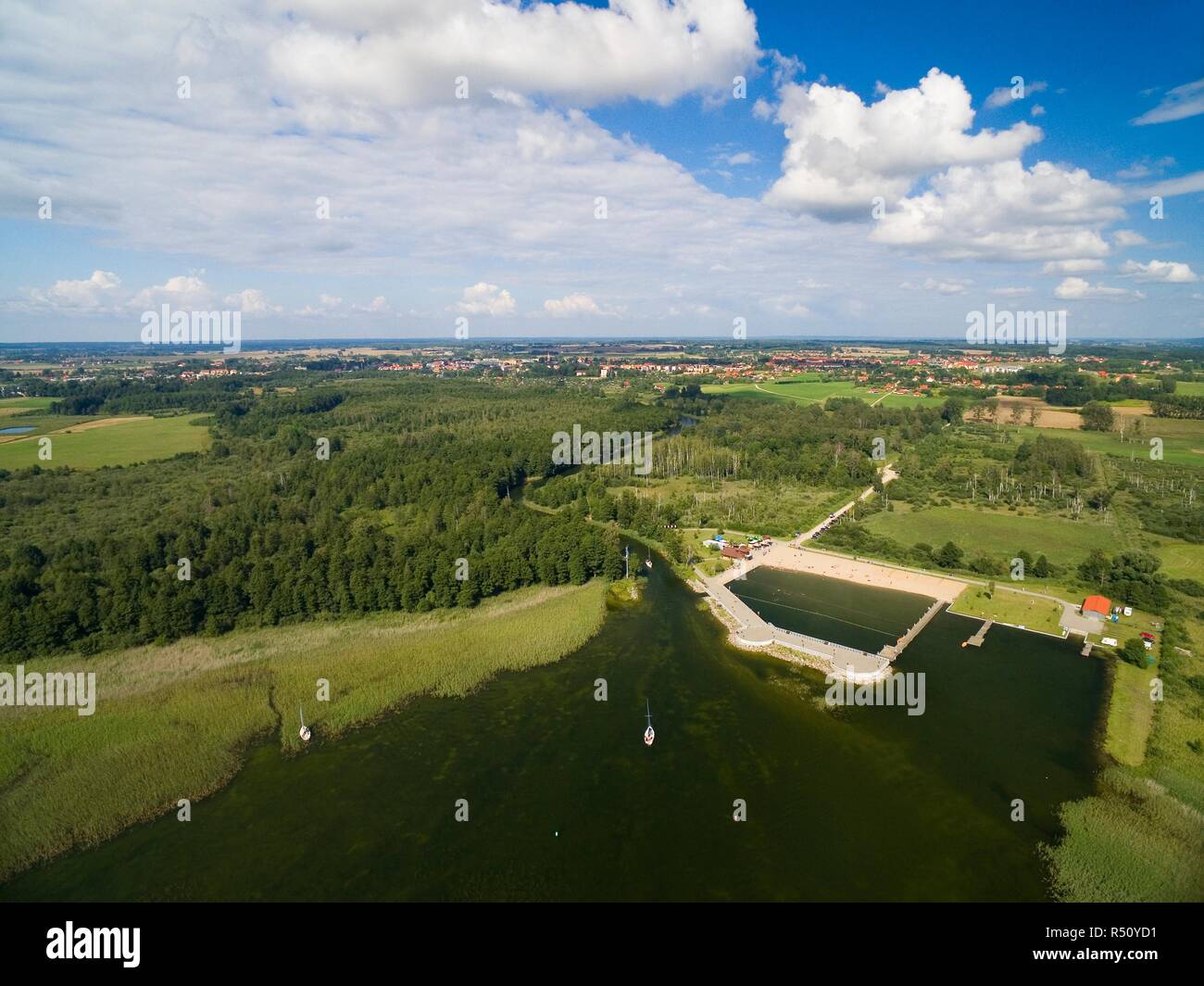 Aerial view of concrete quay and town beach on Mamry Lake, Wegorzewo ...