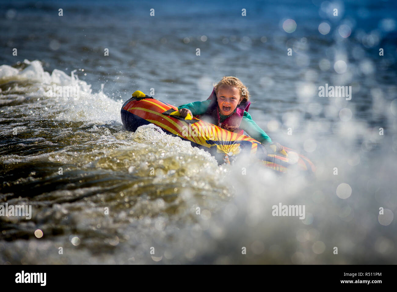 Girl tubing on river hi-res stock photography and images - Alamy