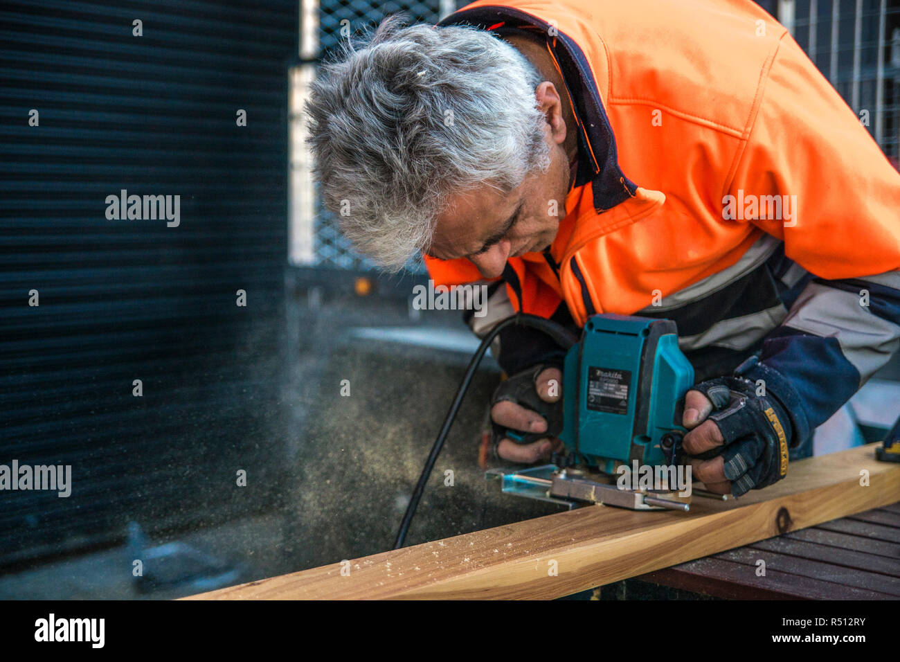 Old carpenter working Stock Photo - Alamy