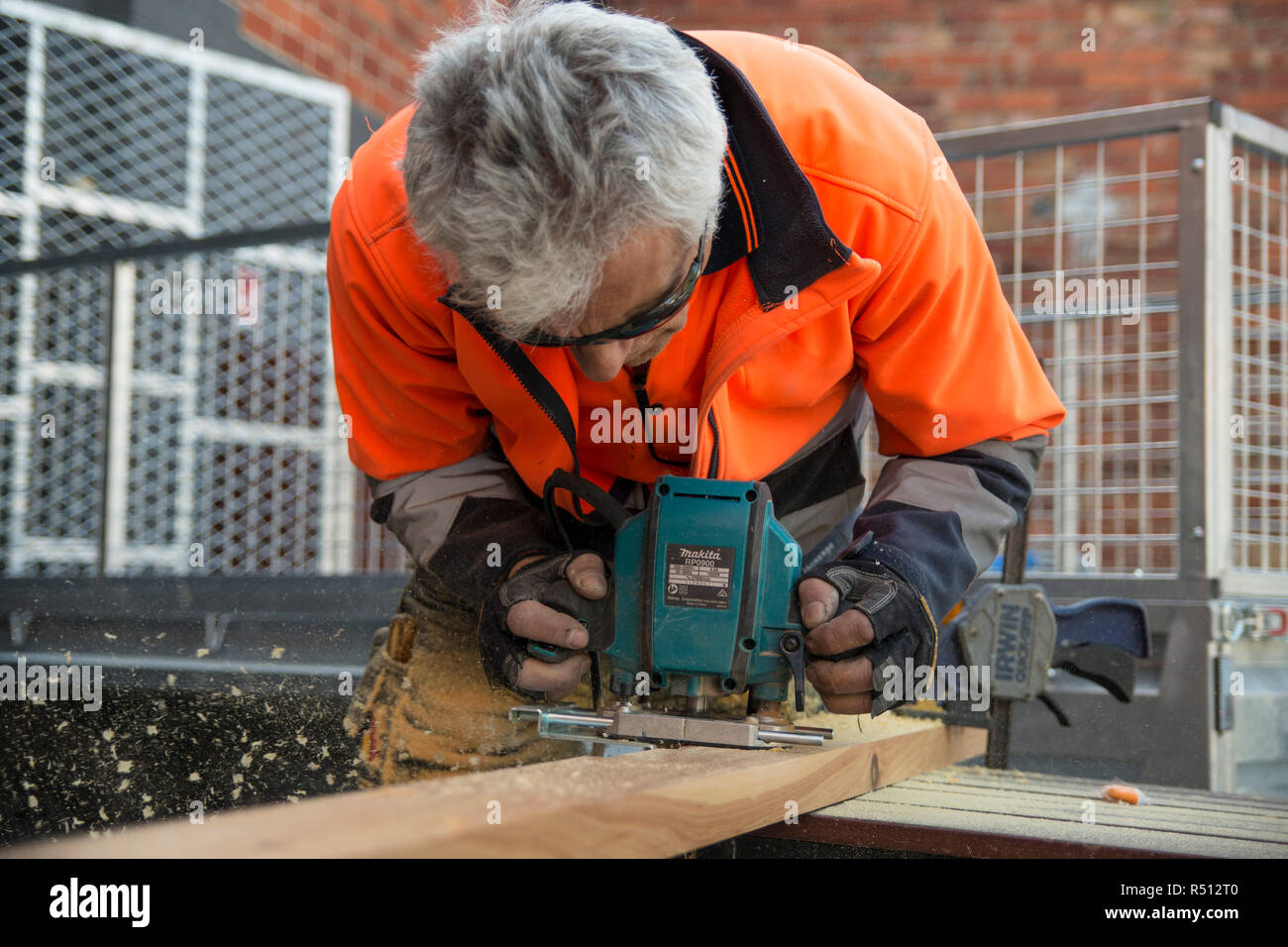 Old carpenter working Stock Photo - Alamy