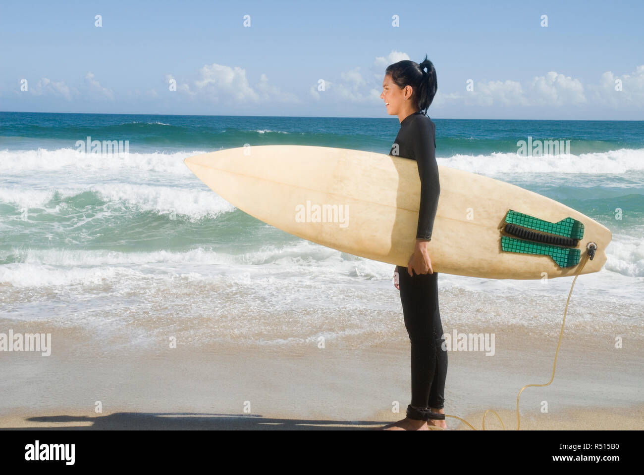 Woman bathing suit shoreline laughing hi-res stock photography and ...