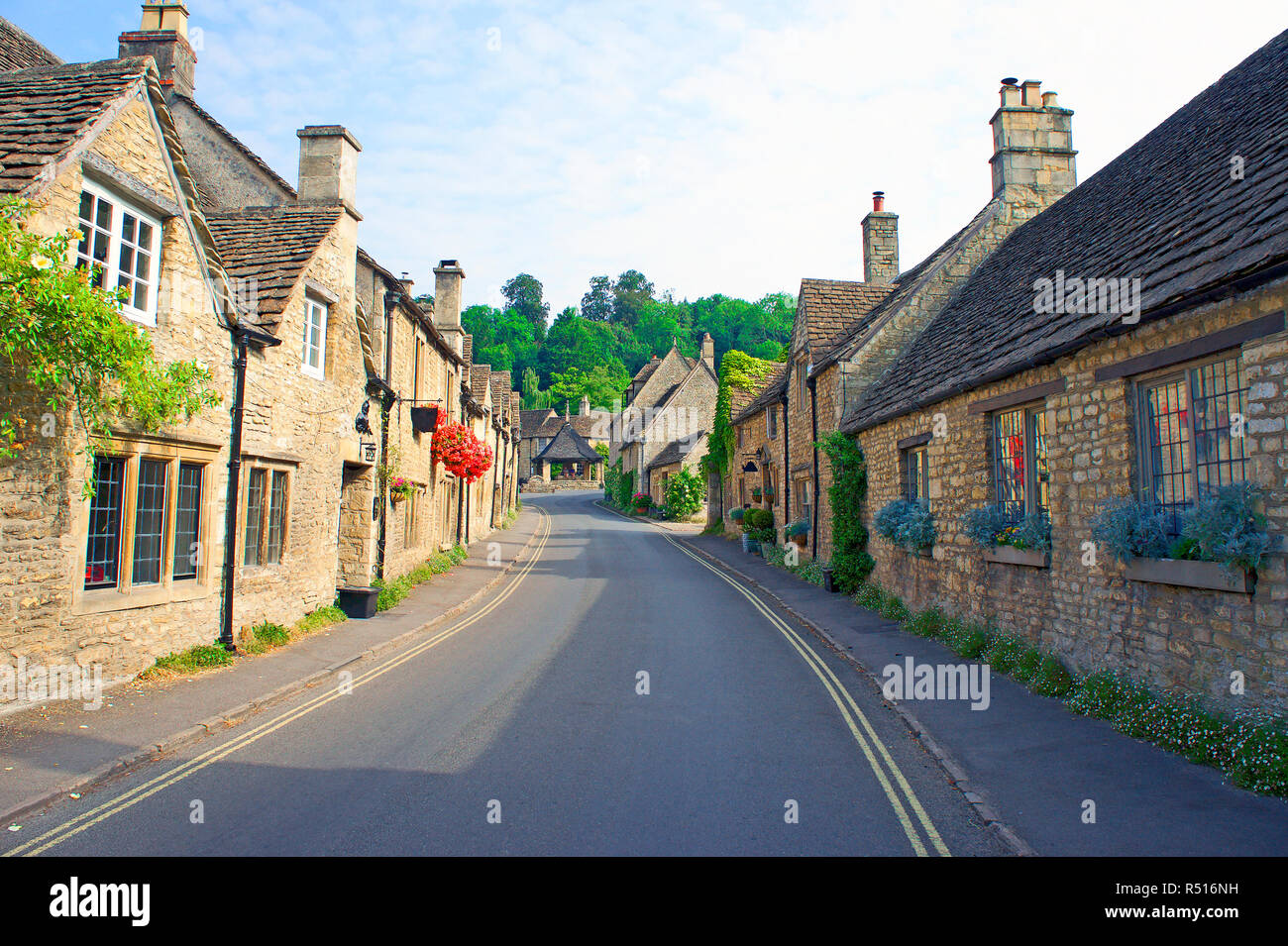 Quaint homes in the Cotswold village of Castle Combe, United Kingdom ...