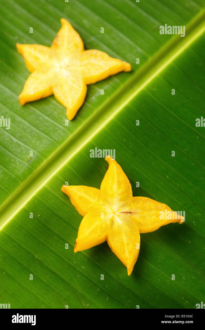 Slices of ripe yellow star fruit carambola or star apple ( starfruit ...