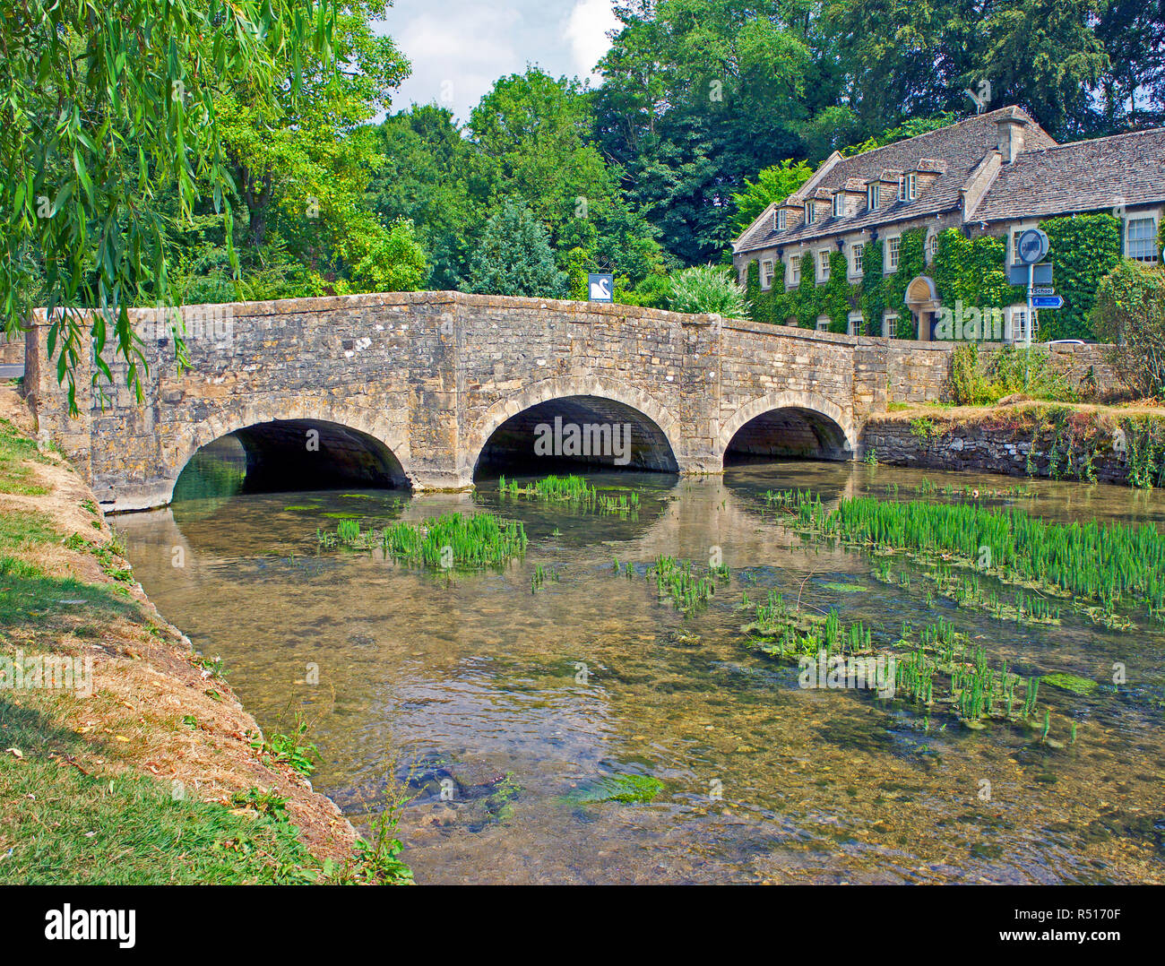 Quaint bridge in the Cotswold village of Bibury, United Kingdom Stock ...