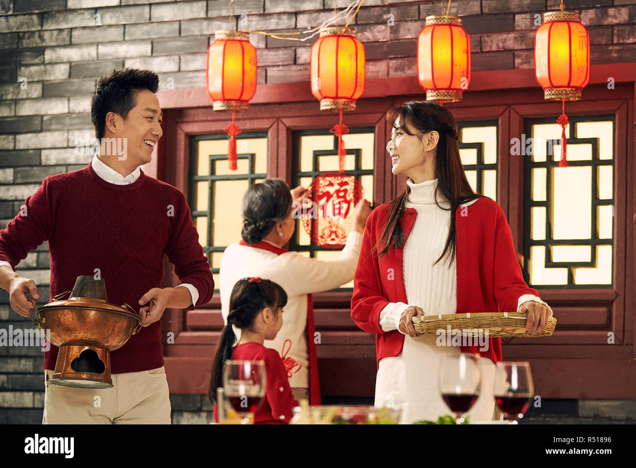 Happy family for dinner Stock Photo - Alamy