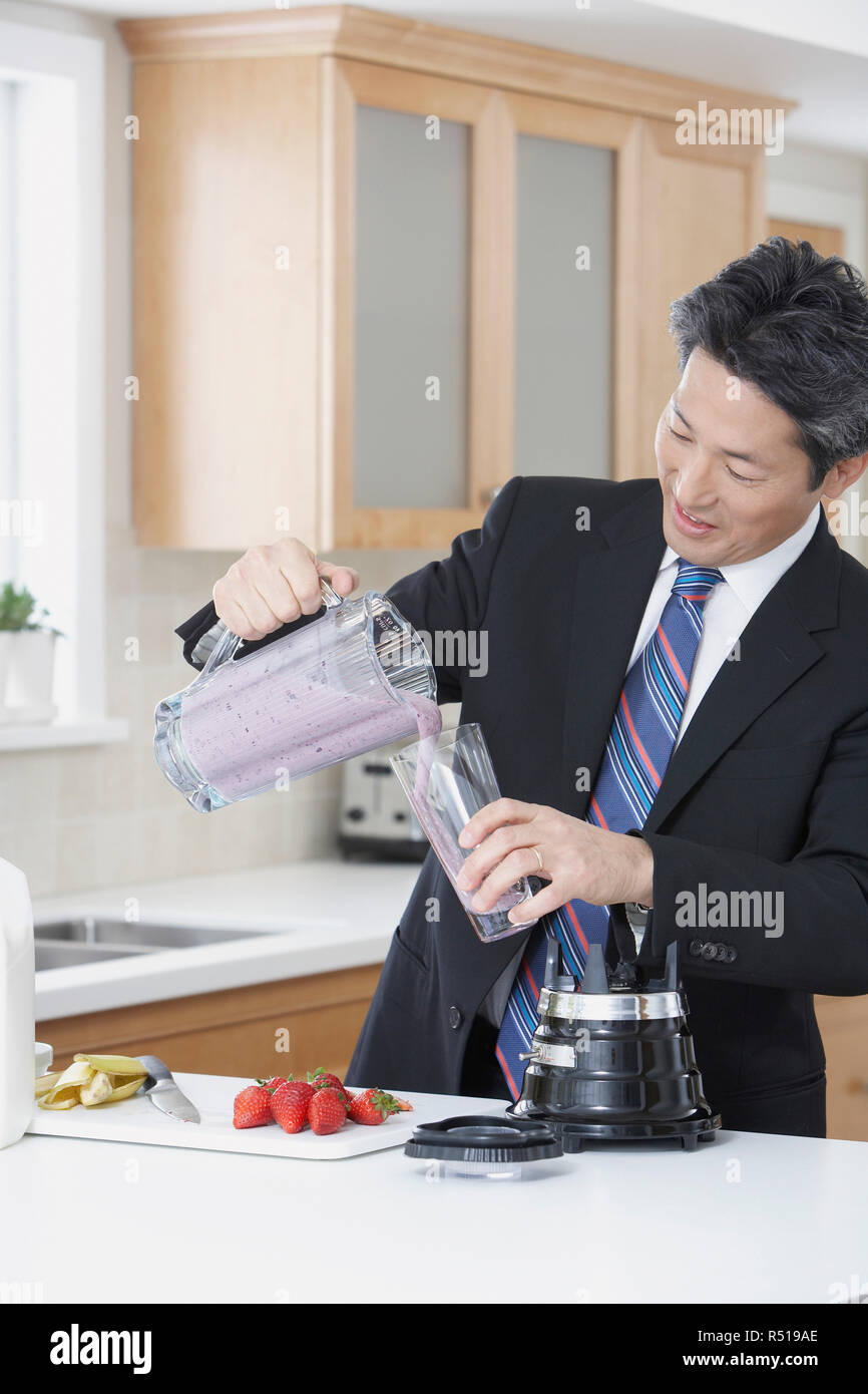 Japanese businessman drinking energy drink hi-res stock photography and ...