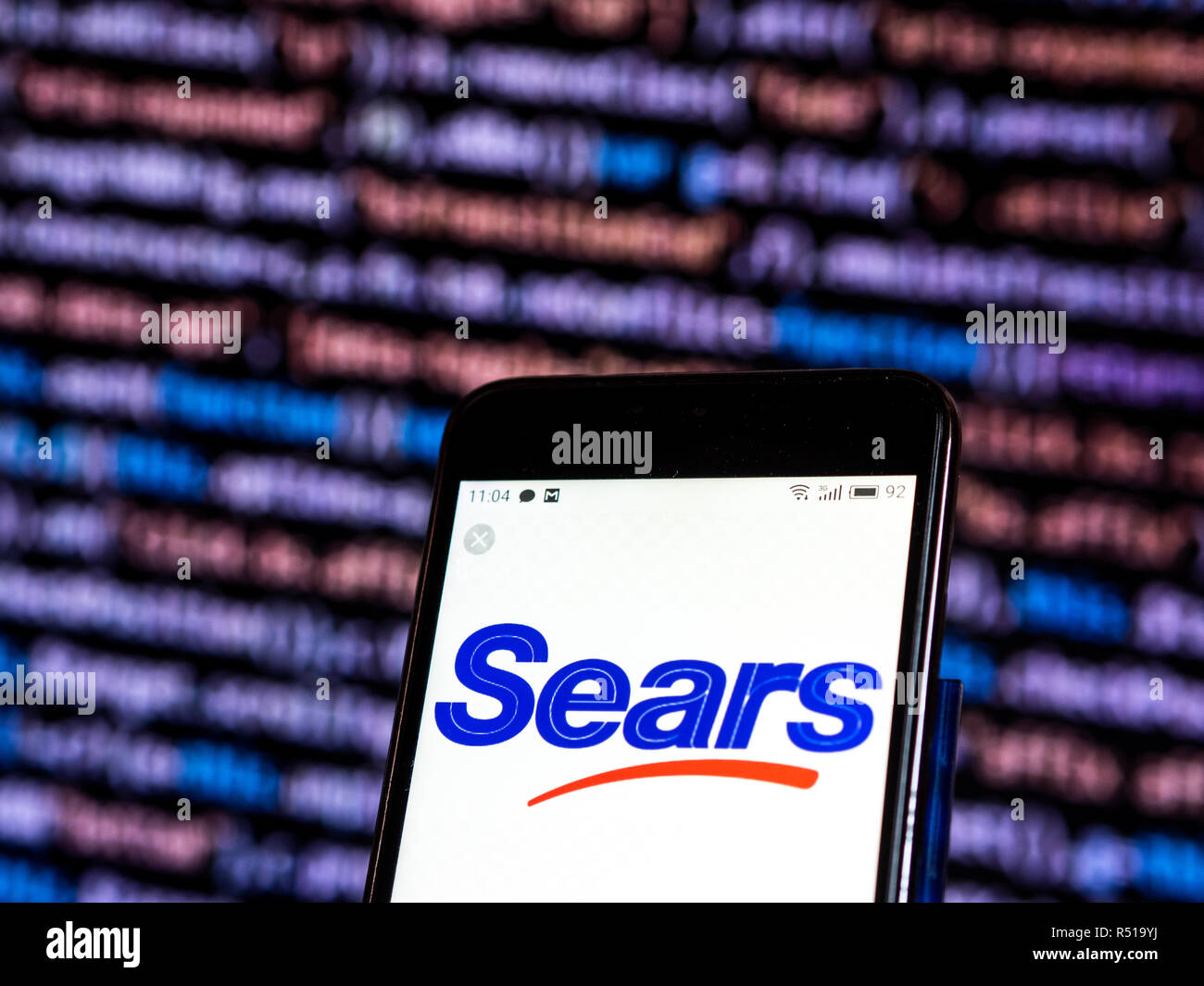 Sears Department store company logo seen displayed on smart phone Stock ...