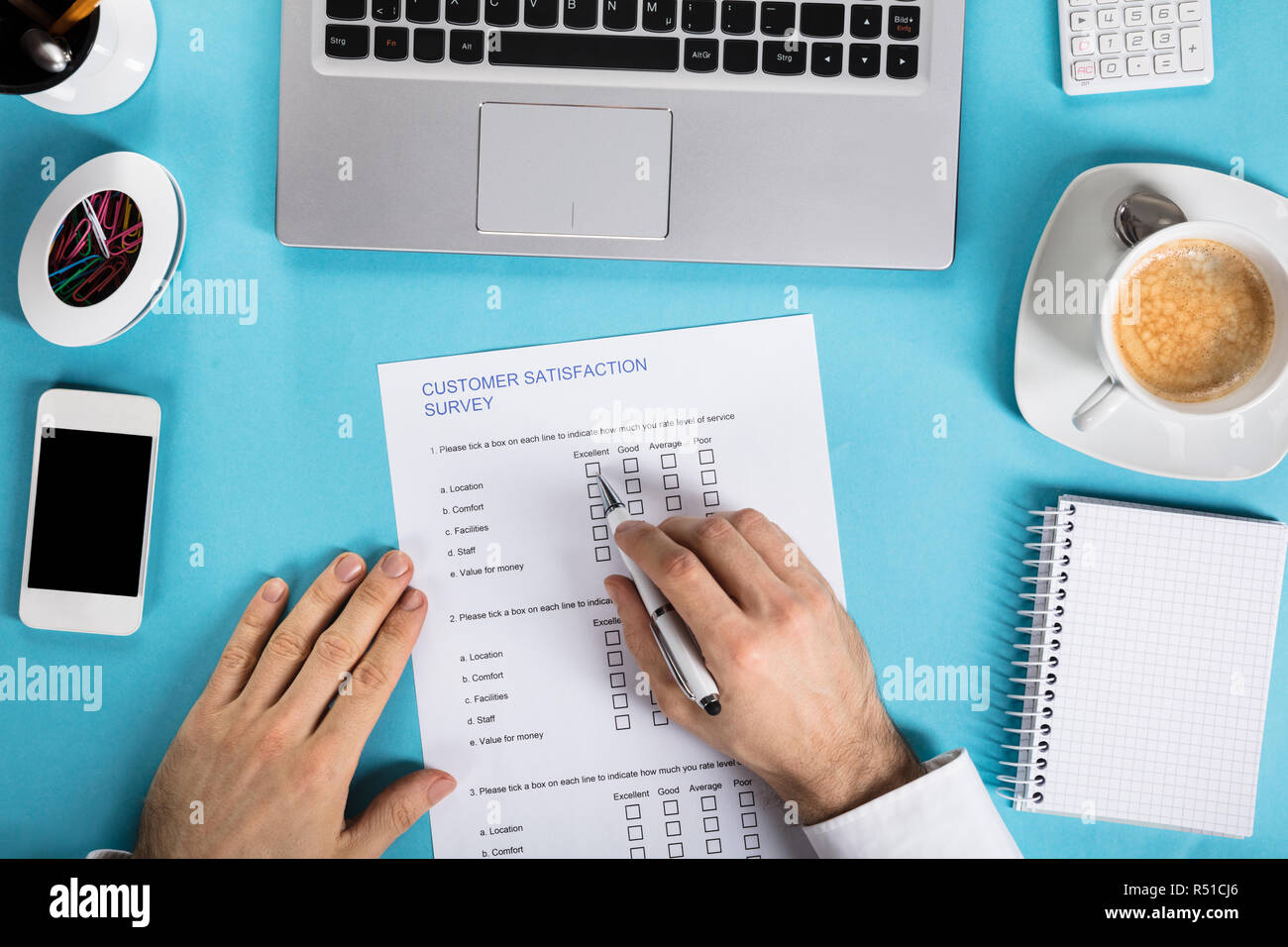 Businessman Filling The Customer Satisfaction Survey Form Stock Photo ...
