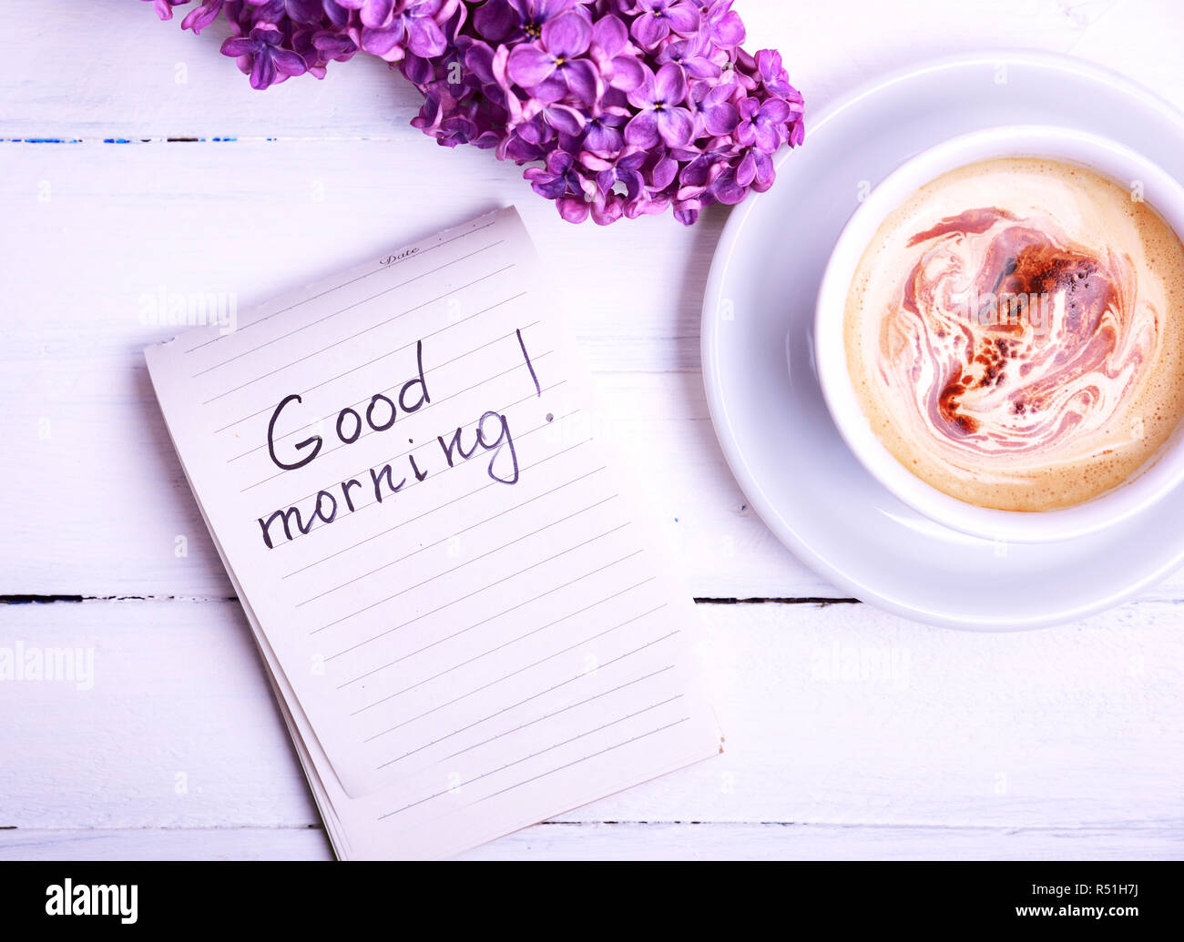 Open notebook with the inscription good morning Stock Photo - Alamy