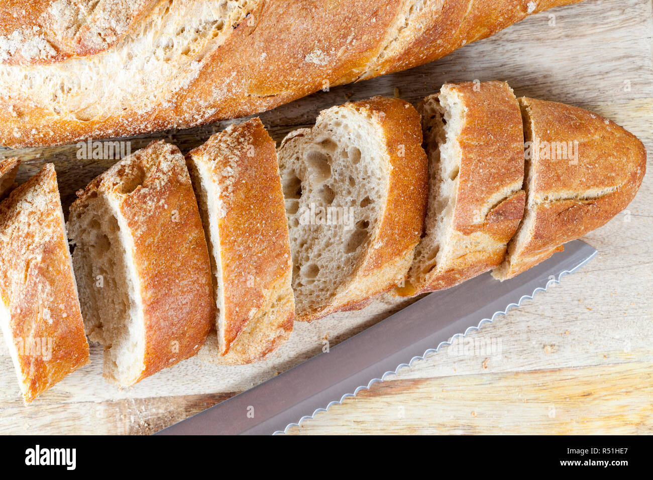 baguette cut into pieces of flour, preparing and serving tables in the ...