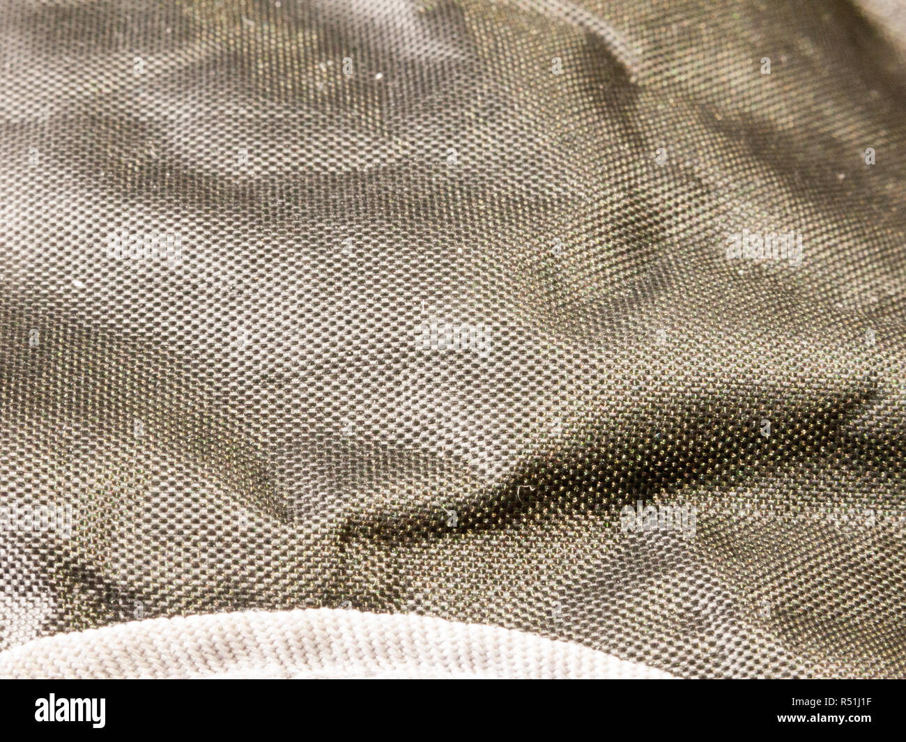 shiny plastic coating texture on clothing up close detail Stock Photo ...