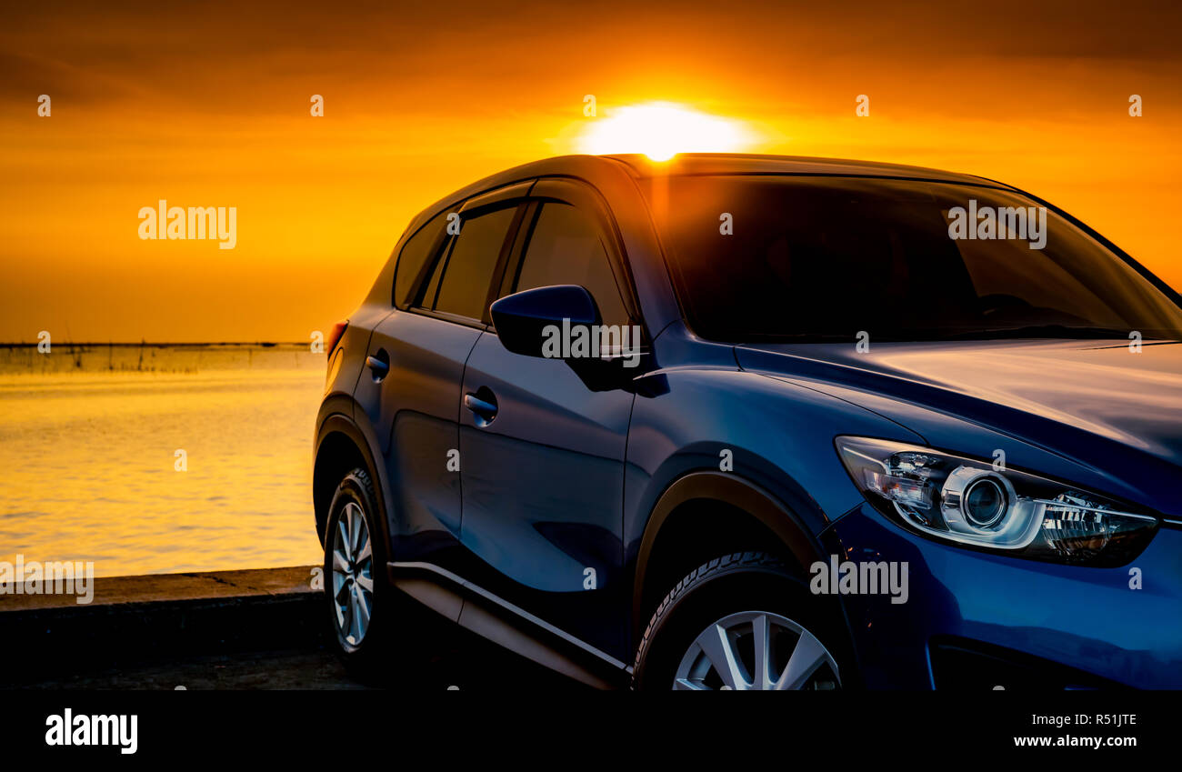 Front view blue compact SUV car with sport and modern design parked on ...