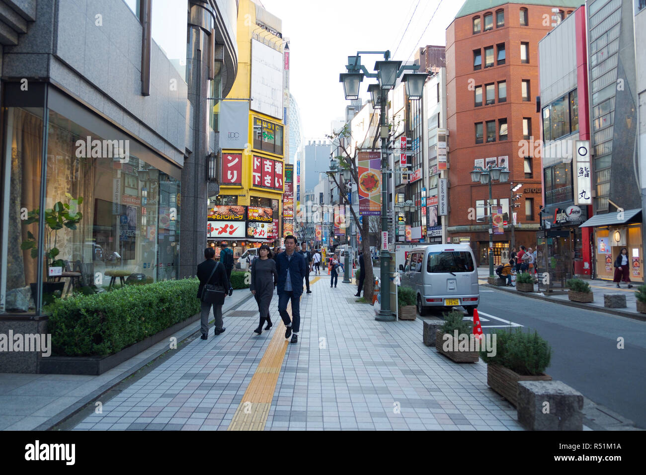 Street in Shinjuku, Tokyo, Japan in the morning Stock Photo - Alamy
