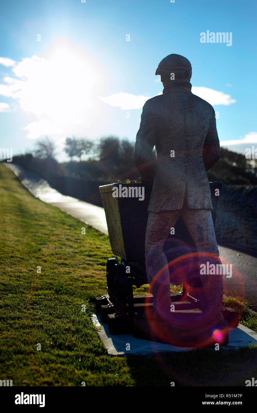 Restored lead mining tub and sculpture of miner, Rowley Bank ...